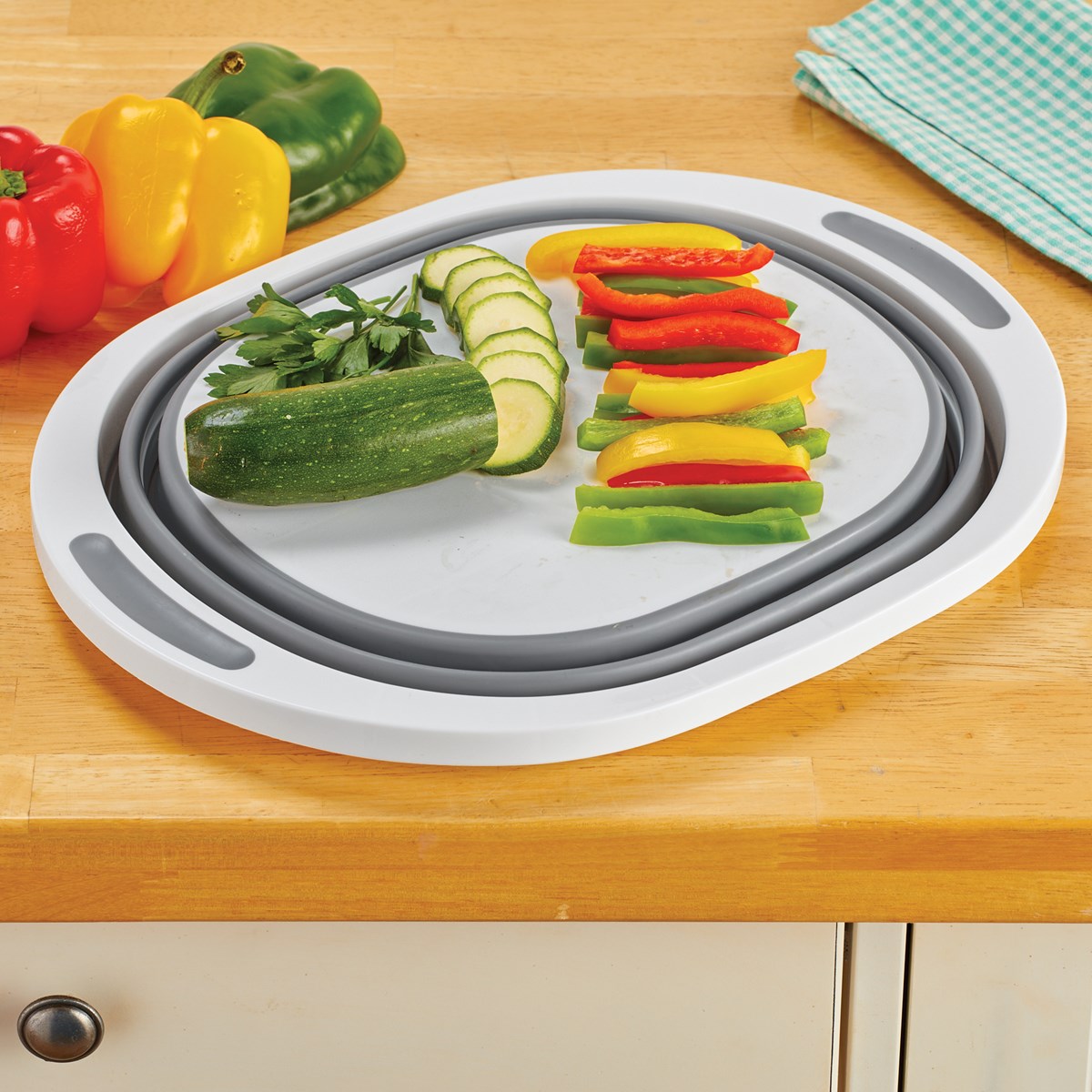Collapsible Skid-Resistant Oval Chopping Board | Collections Etc.