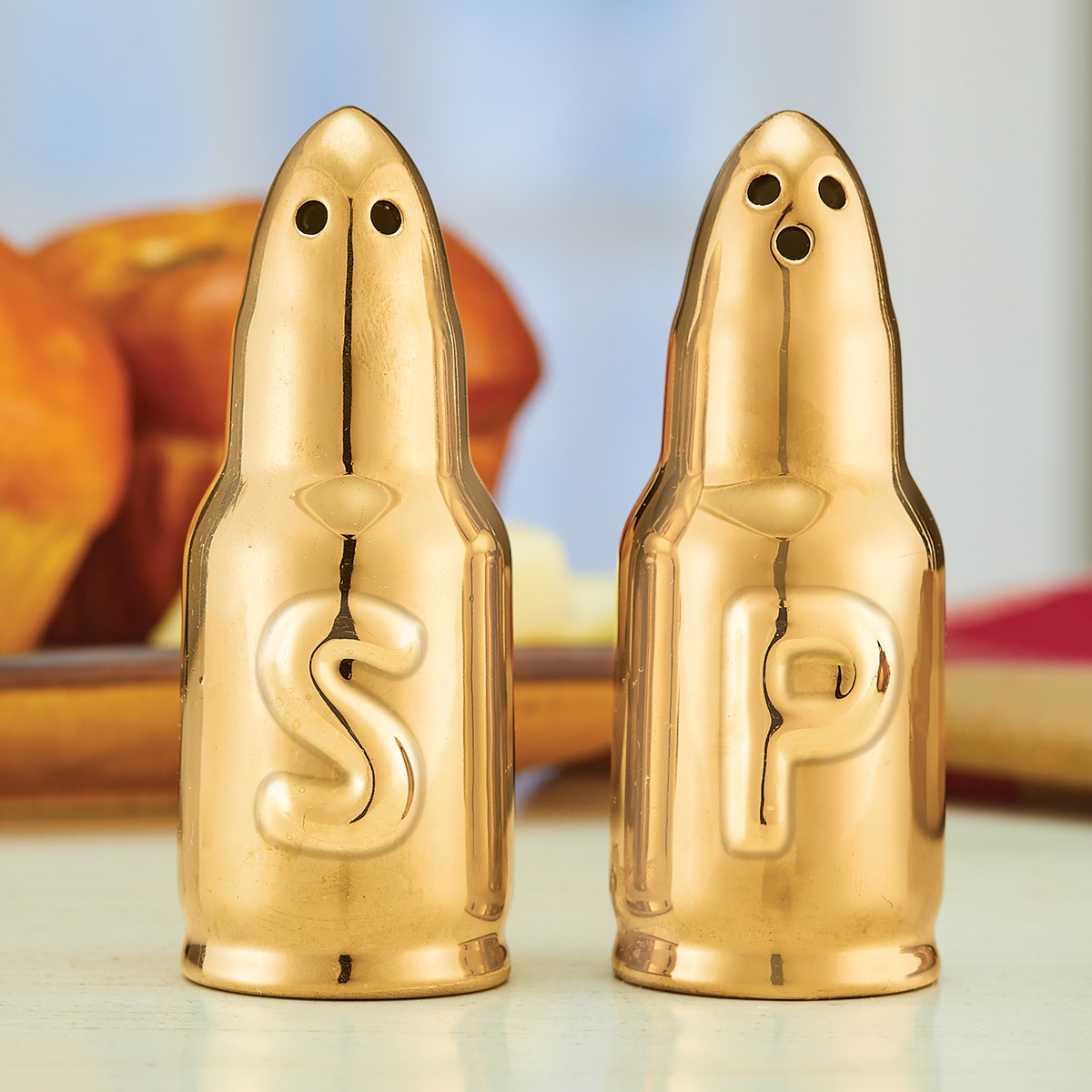 Gold Tone Bullet-Shaped Salt & Pepper Shakers | Collections Etc.